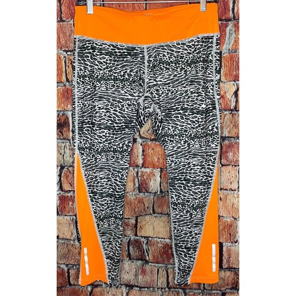 Nike | Pants & Jumpsuits | Nike Sportswear Drifit Orange Black Leopard ...